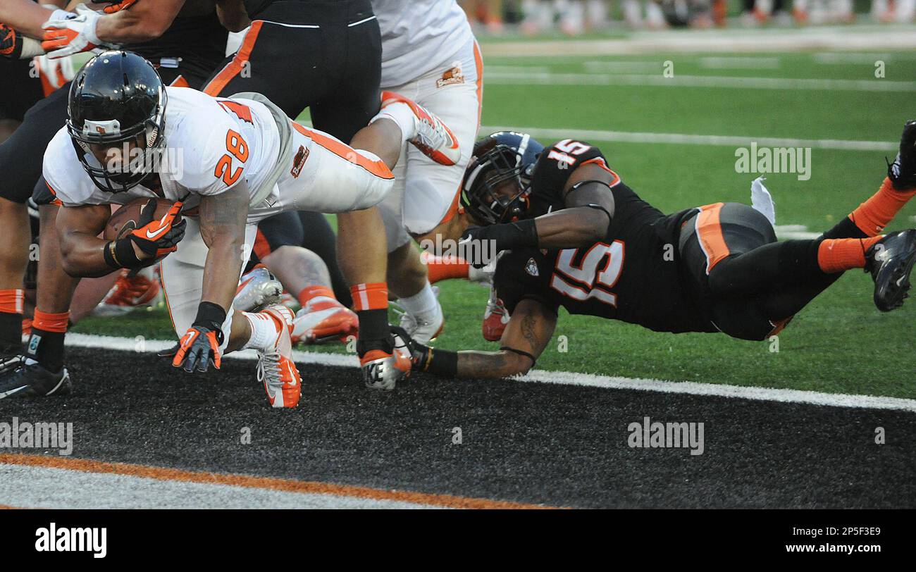 Oregon State running back Terron Ward dives into then end zone in front ...