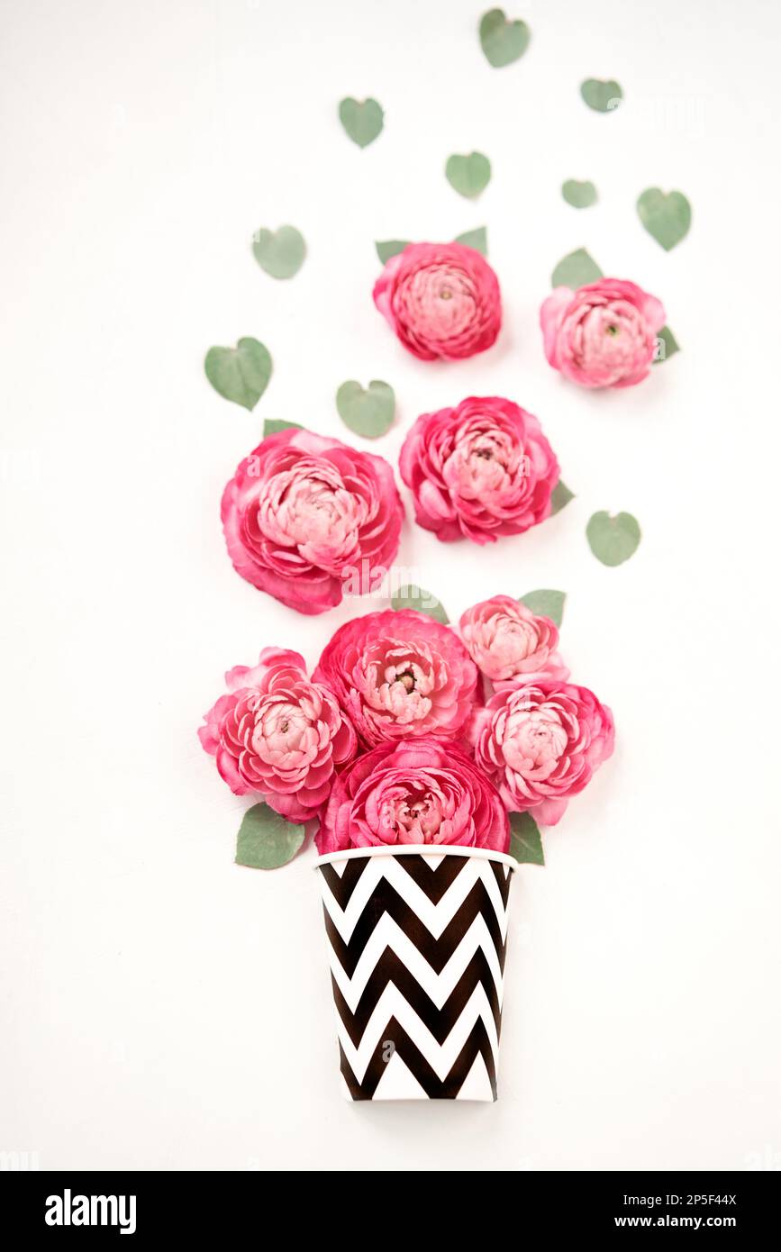 The concept of a flower shop and coffee shop. A coffee cup and flowers ...