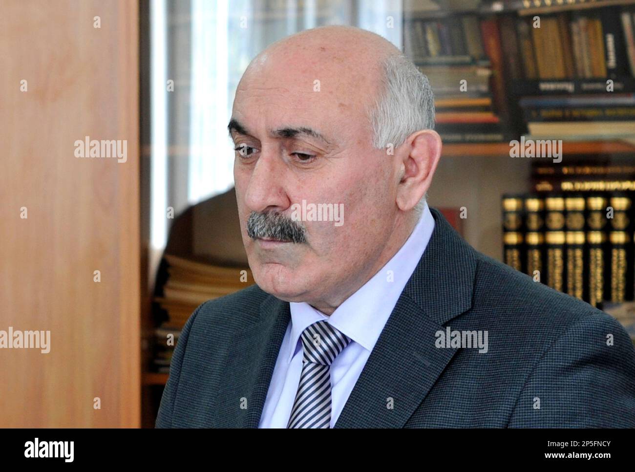 Emirmagomed Daudov, Director of School No. 1, pauses as he speaks to ...