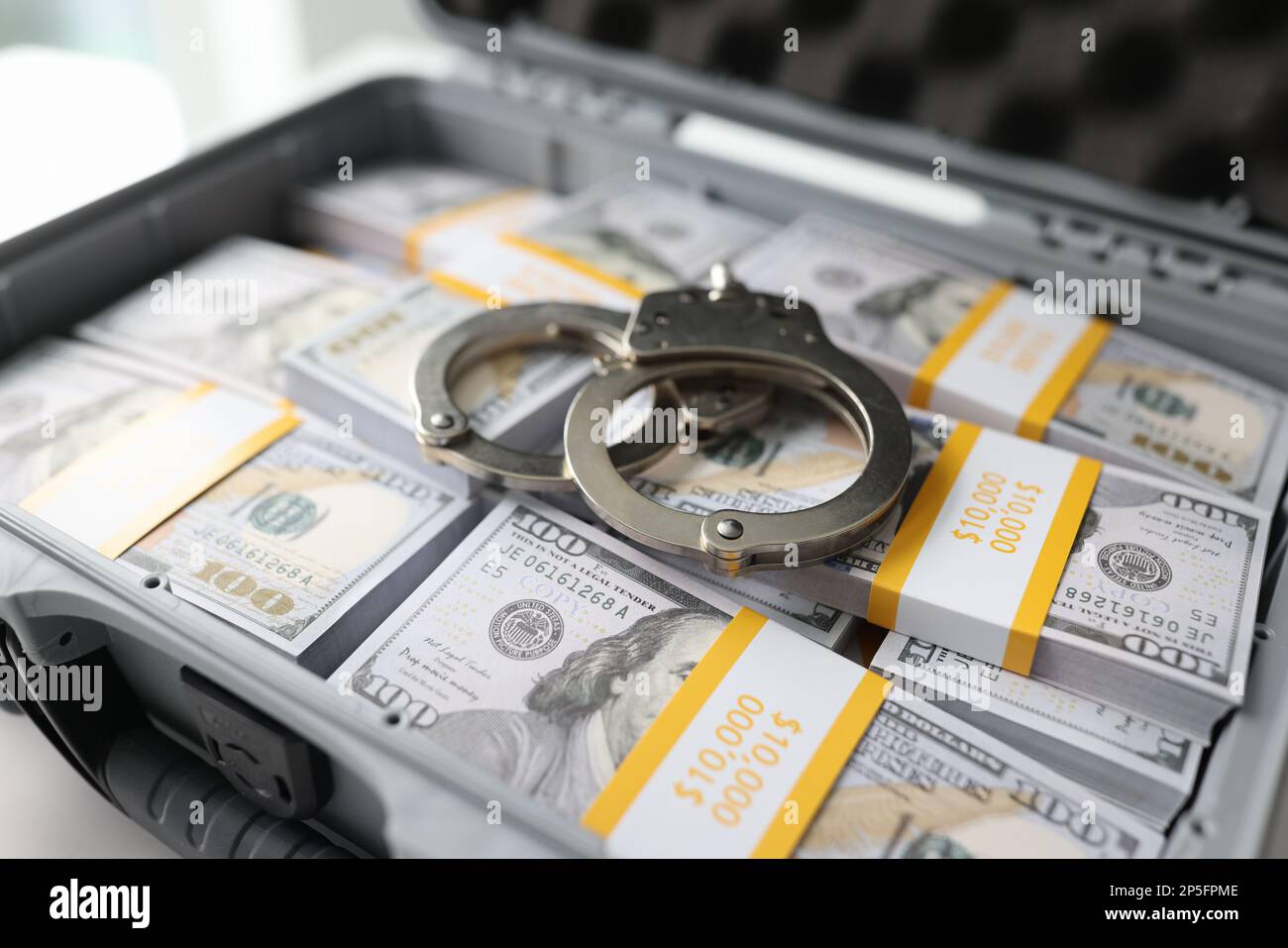 Metal suitcase with money, concept of arrest, investigation and fraud ...