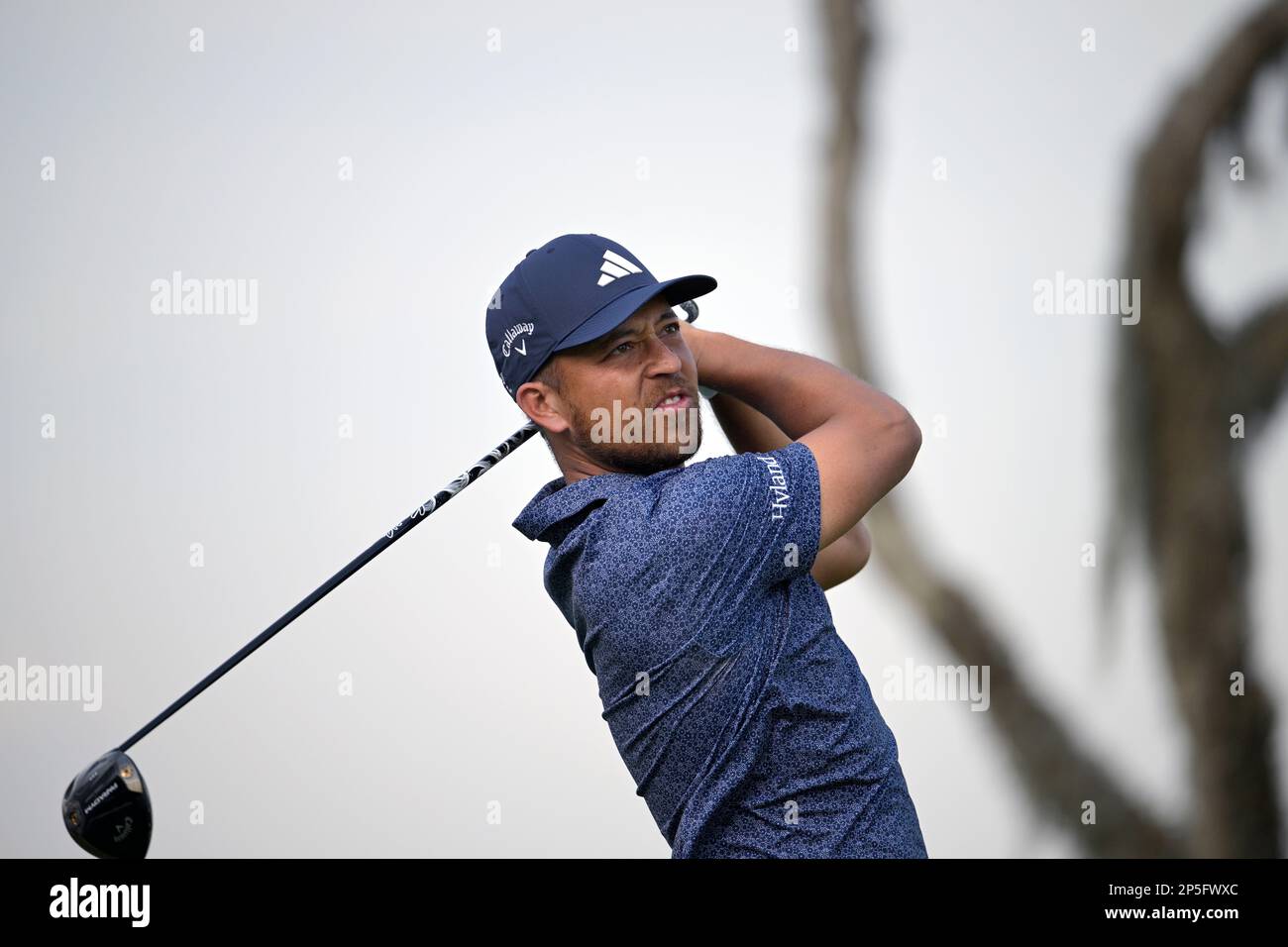 Xander Schauffele watches his tee shot on the 15th hole during the ...