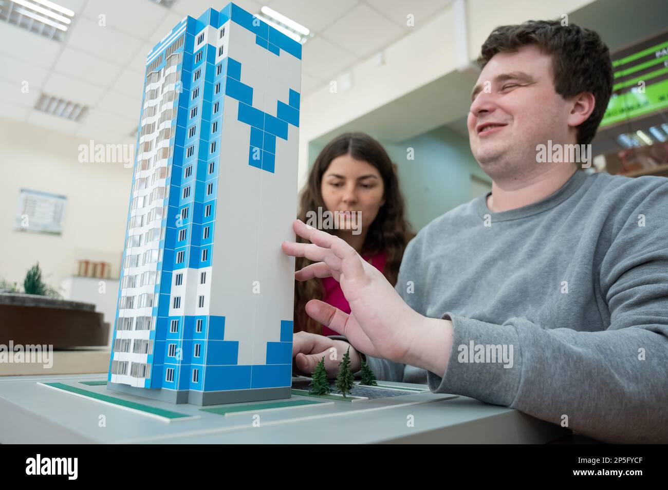 A visually impaired man uses a scanning and reading machine Stock Photo ...