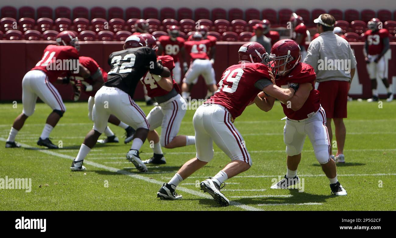 Alabama linemen attend spring football practice at Bryant-Denny Stadium ...
