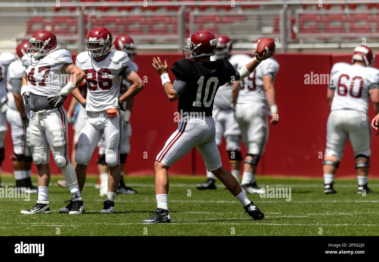 Alabama quarterback AJ McCarron (10) throws in passing drills during an ...