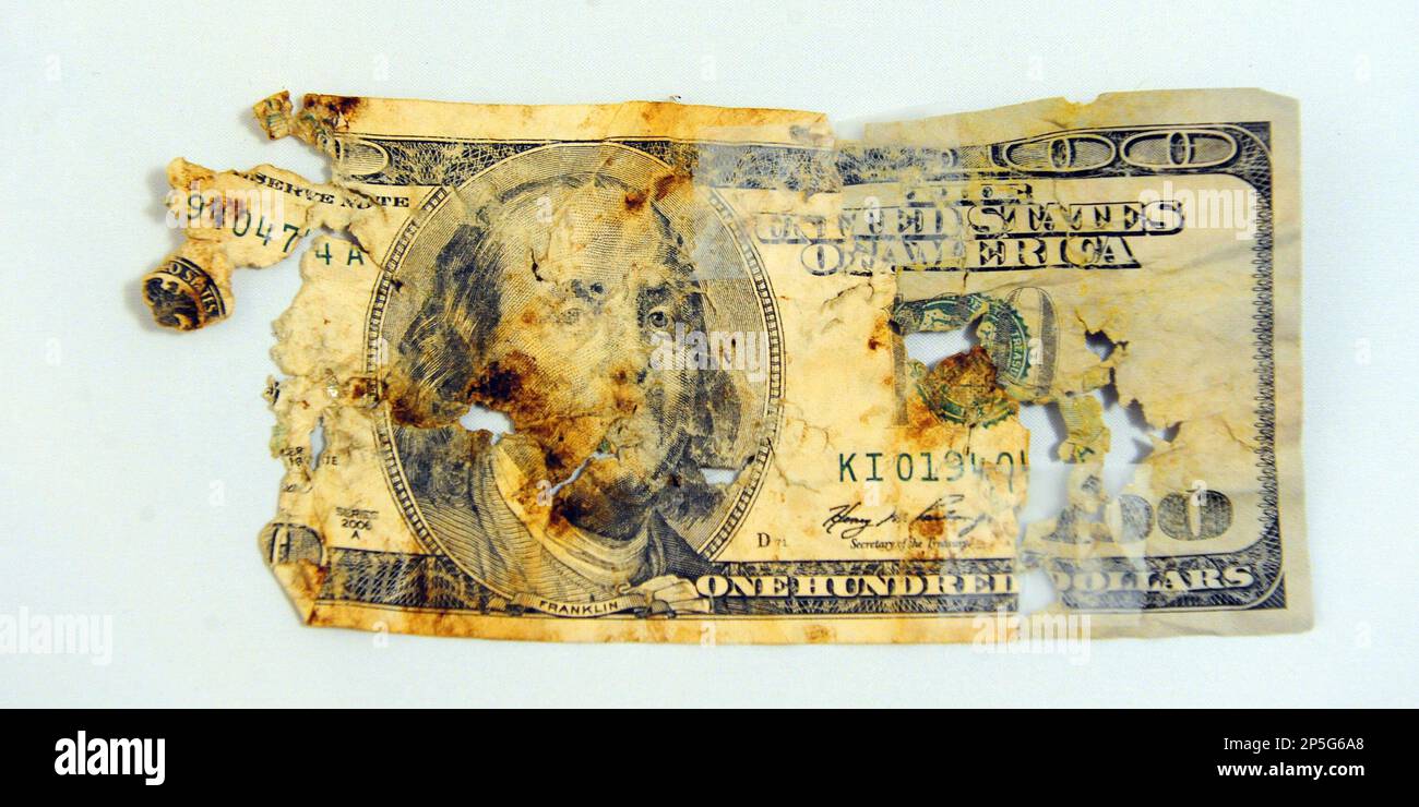 This March 8, 2013 photo shows one of the five $100 bills recovered ...