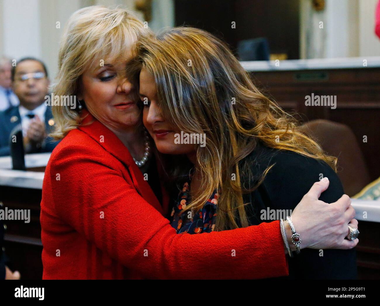 Oklahoma Gov. Mary Fallin hugs Jane Horton, right, of Owasso, Okla ...