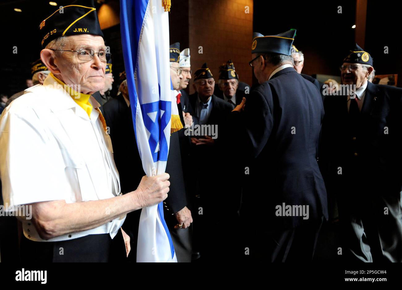 Marv Delidow, a Jewish War Veteran for the U.S. Army, waits to carry in ...