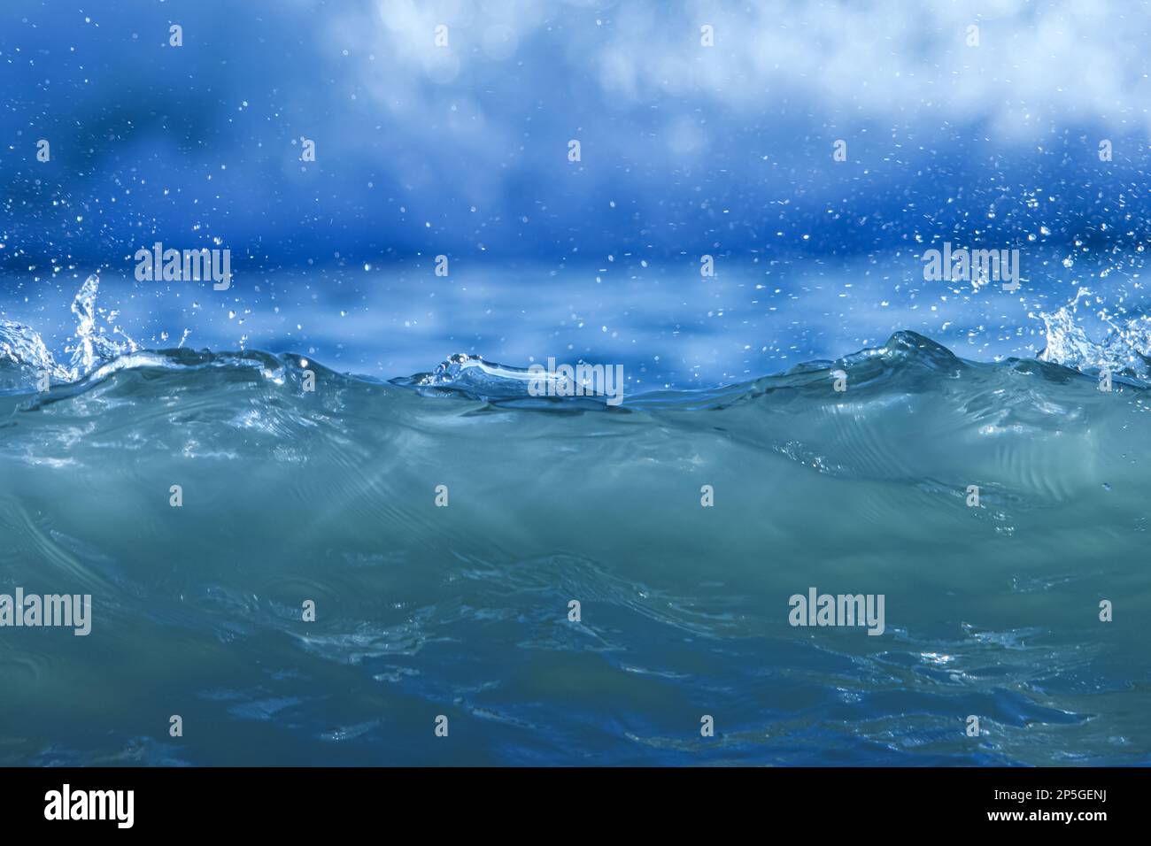 Ocean wave splashing on the beach. Sea wave Stock Photo - Alamy