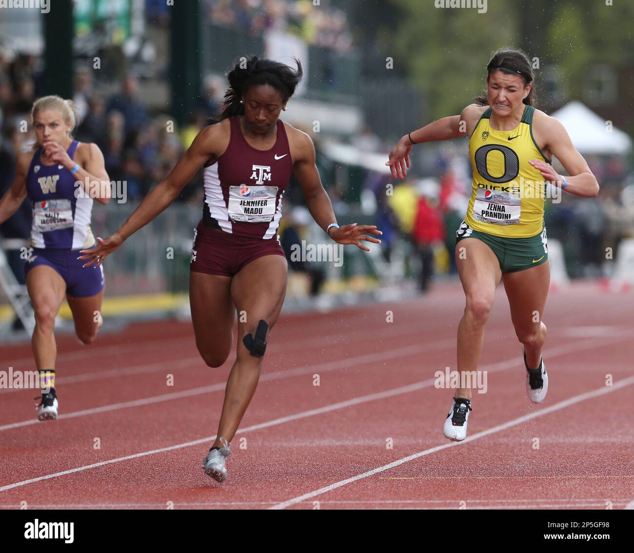 Texas A&M's Jennifer Madu wins a heat of the women's 100 meters ahead ...