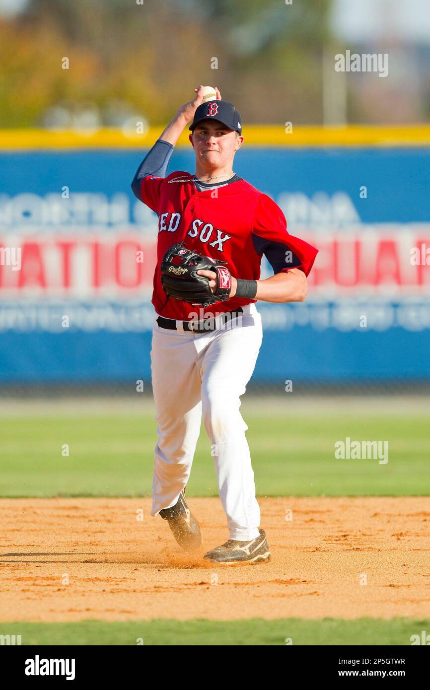 Ryder Jones (26) of Watauga High School makes a throw to first base ...