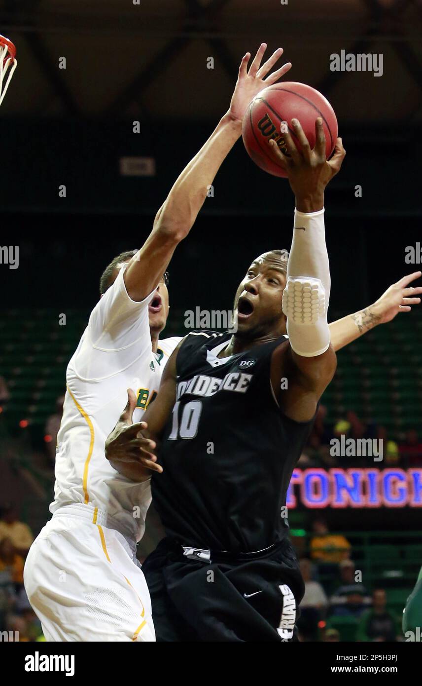 Providence's Kadeem Batts (10), right, shoots past Baylor's Isaiah ...
