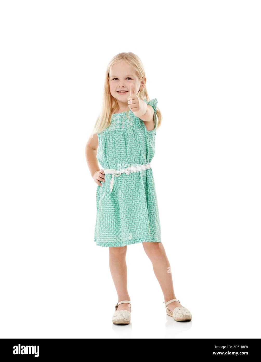 Good job. Studio shot of a cute little girl giving you thumbs up ...