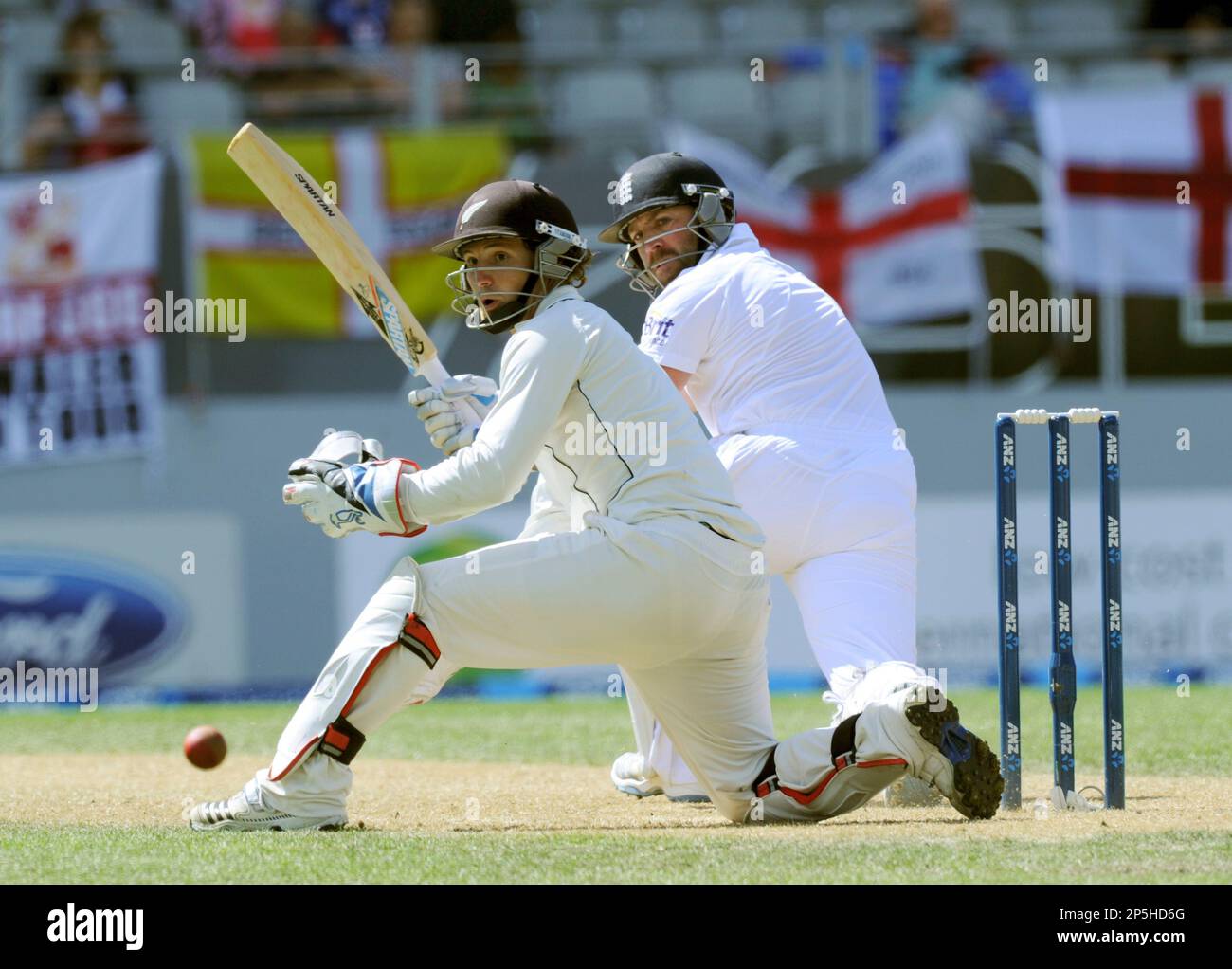 England's Matt Prior, right, pulls the ball down legside past New ...