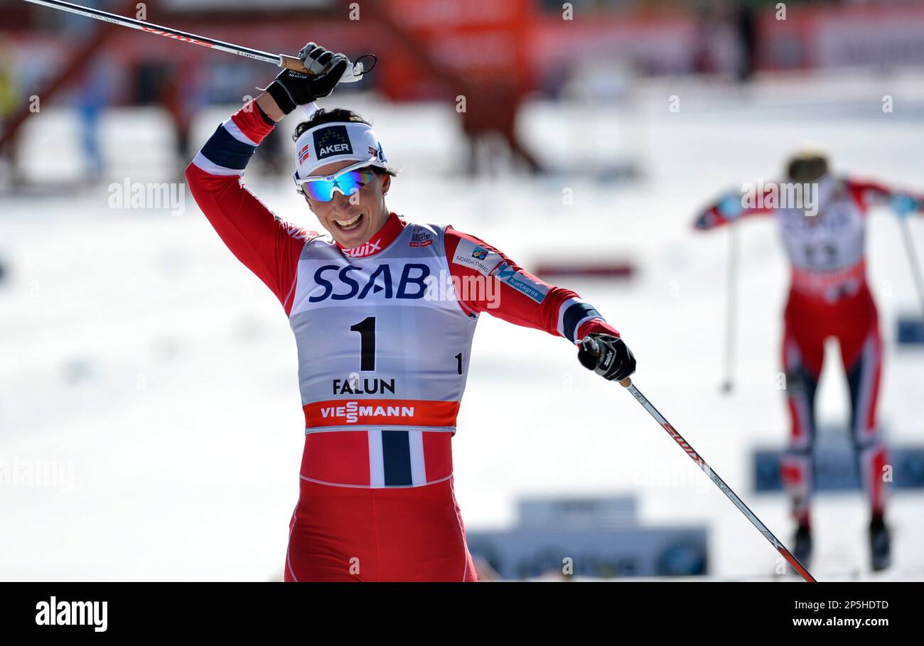Norway's Marit Bjorgen reacts as she passes the finish line during the ...