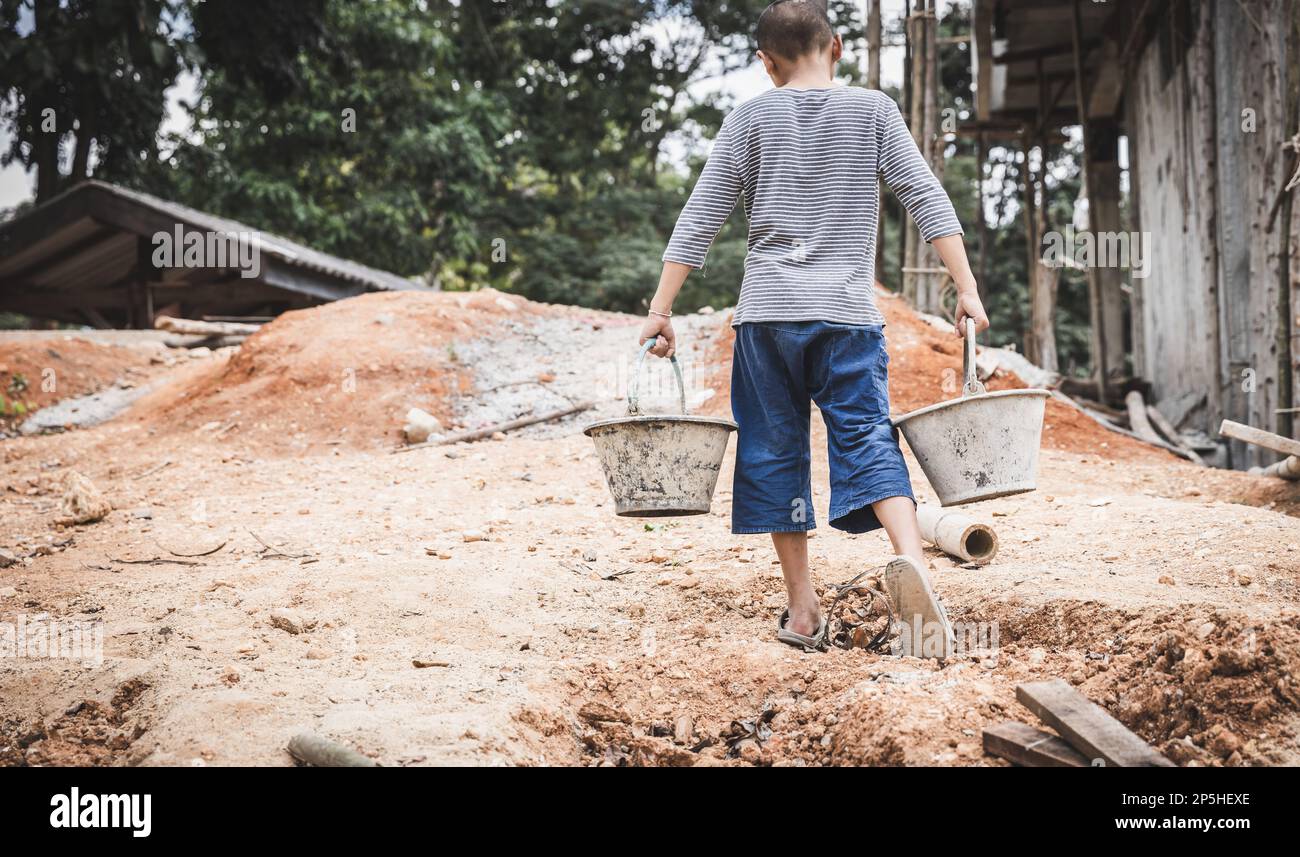 Poor children working at construction site against children labour ...