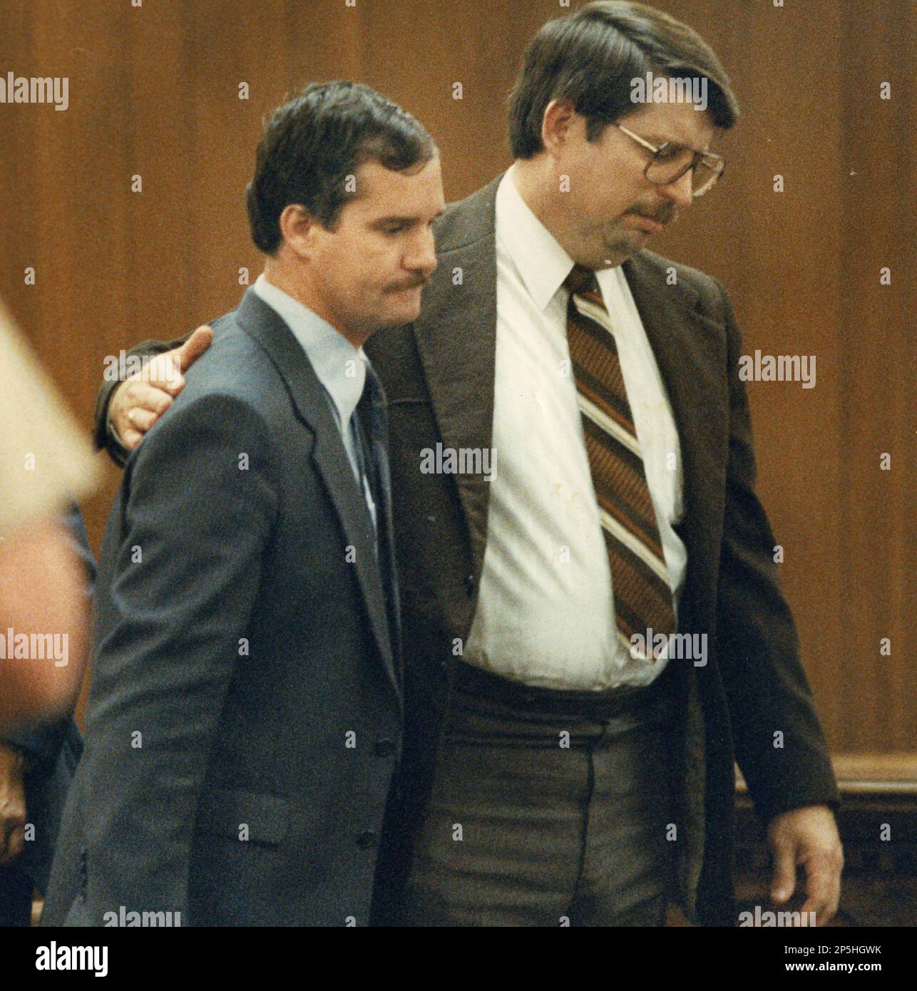 In this 1988 photo, Edward Graf, left, is consoled by Don Youngblood, a ...