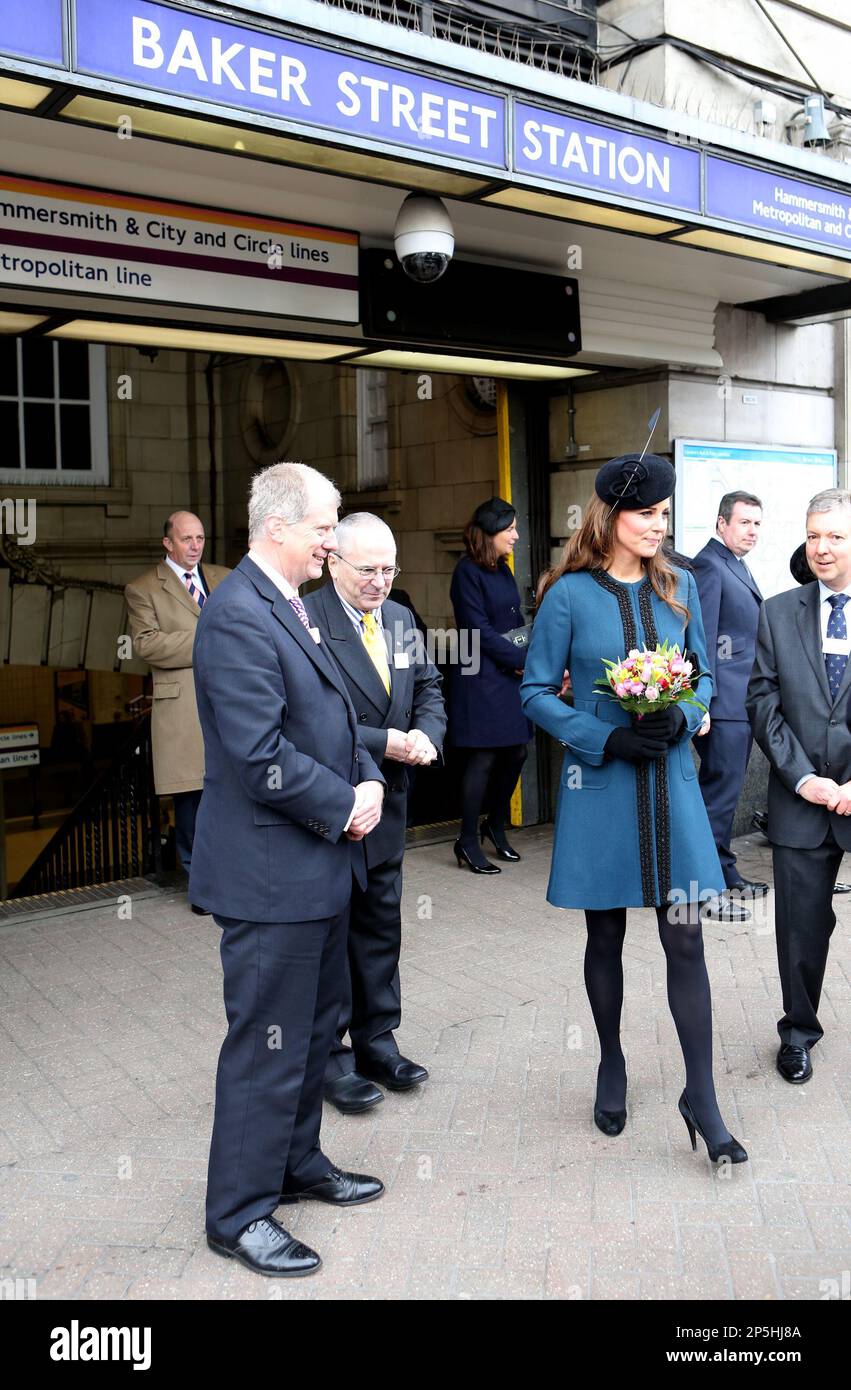 Britain's Kate, Duchess of Cambridge, accompanies Queen Elizabeth II ...