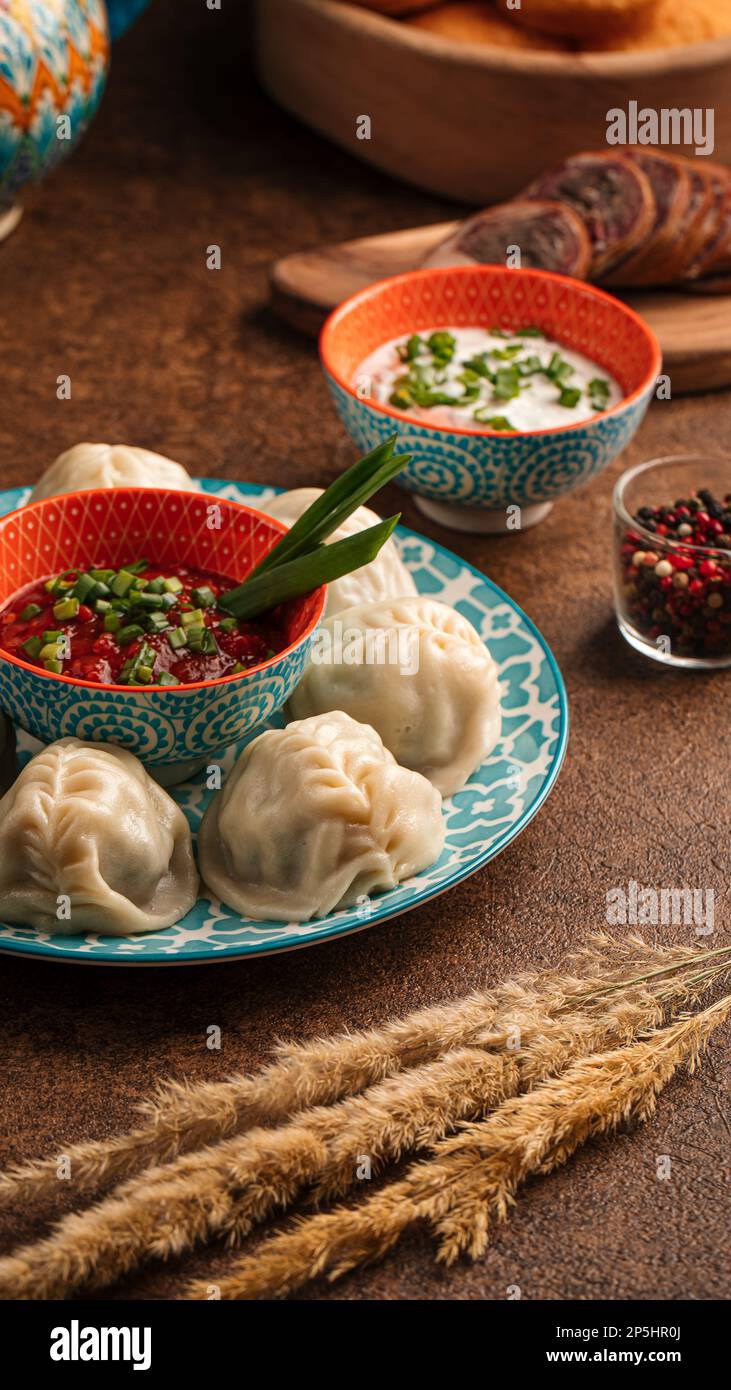 Portion of steamed tatar manti dumplings Stock Photo - Alamy