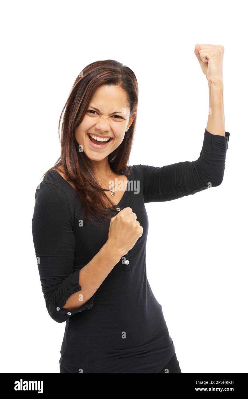 Celebrating life. Studio portrait of an attractive young woman cheering ...