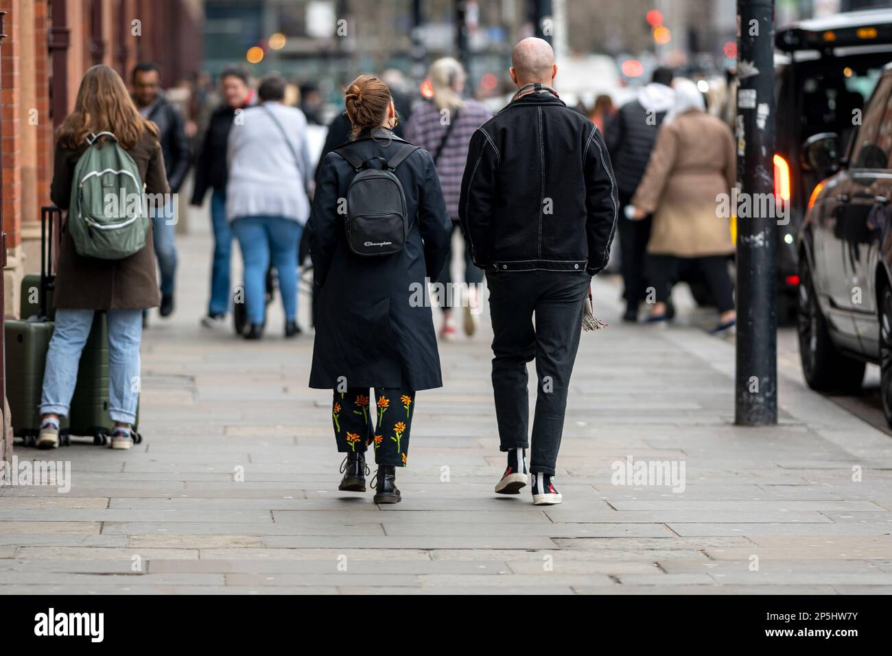 People walking outside the King's Cross underground station in London ...