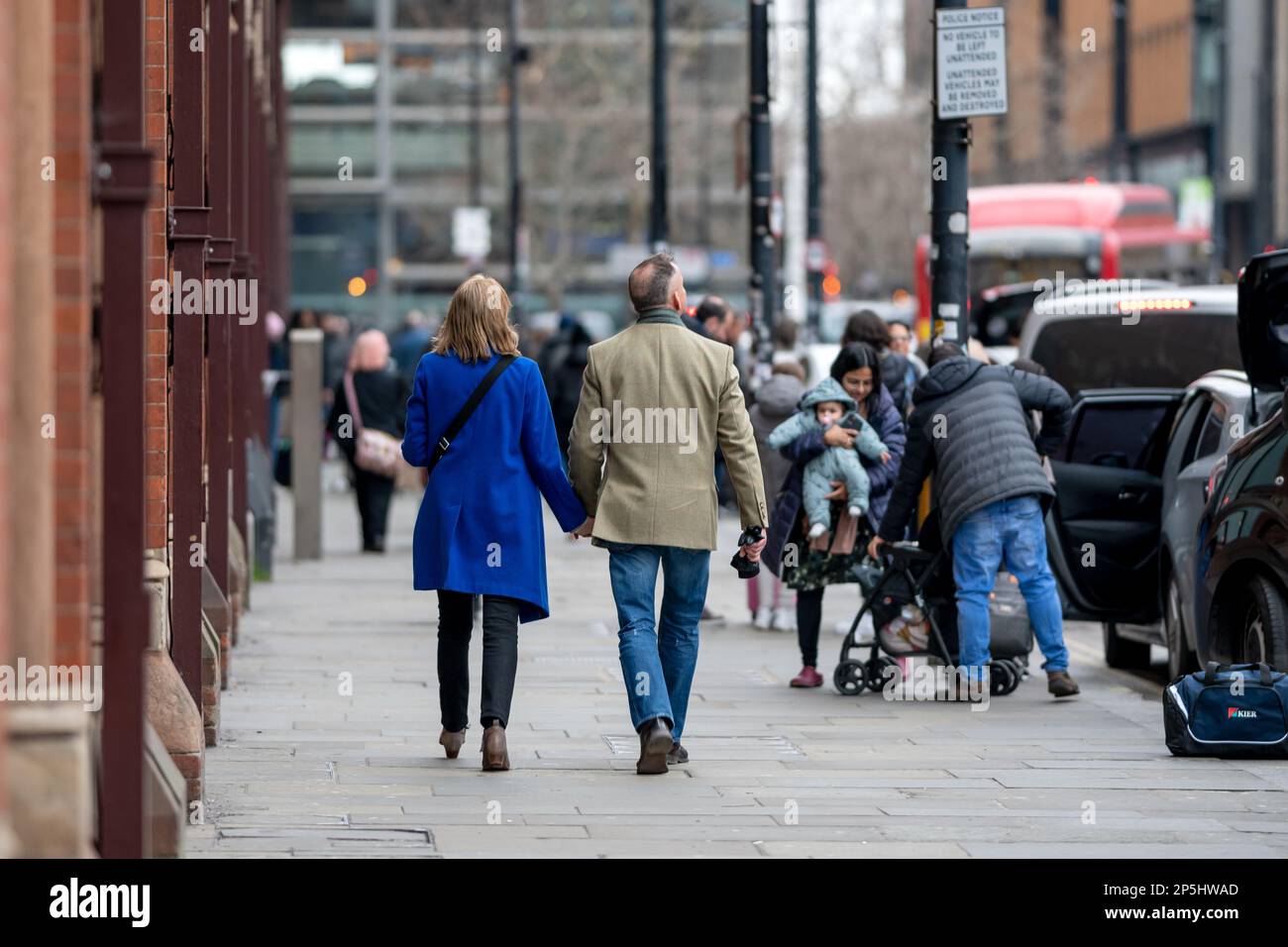 People walking outside the King's Cross underground station in London ...