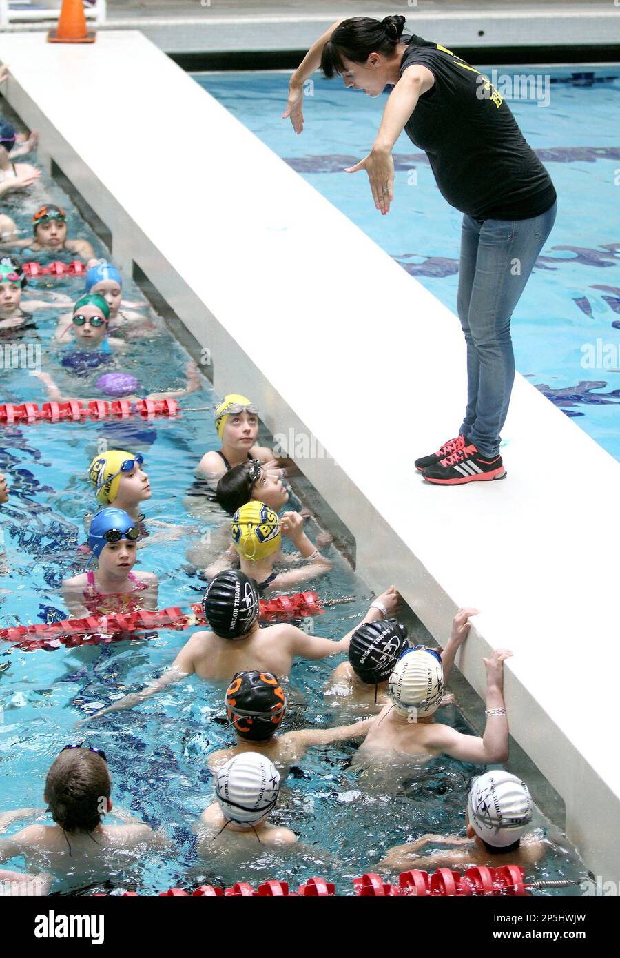 Young swimmers 10-and-under watch as seven-time Olympic swim medalist ...