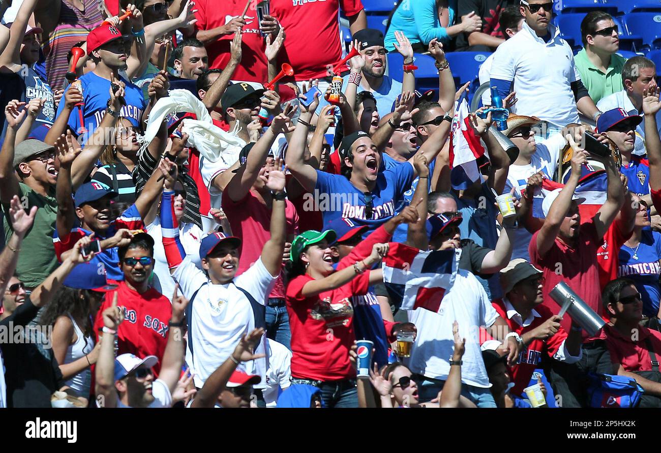 Baseball fans cheer during the eighth inning of a World Baseball ...