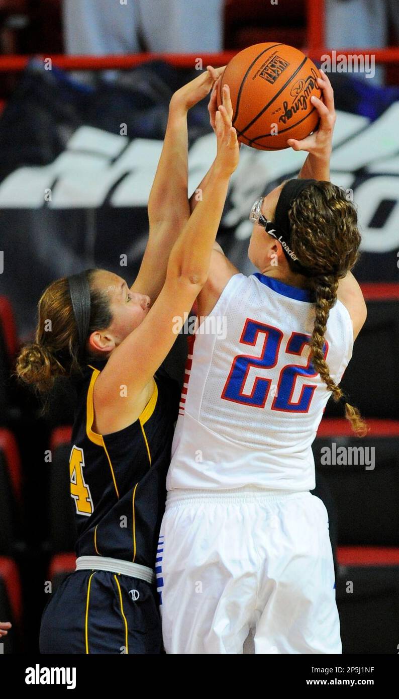 Notre Dame's Carlee Clemons, left,and Madison Central's Ashton Feldhaus ...