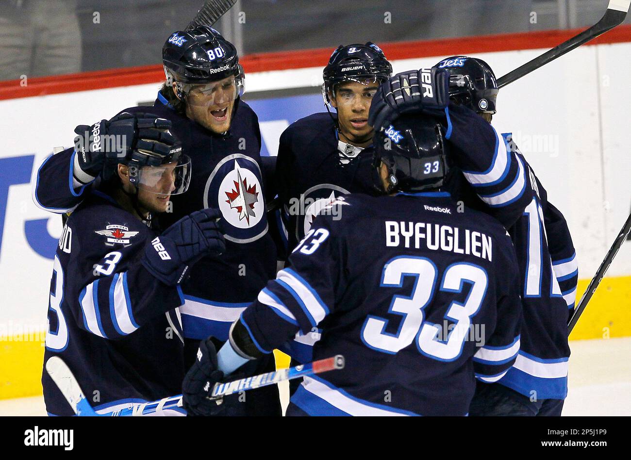 Winnipeg Jets' Kyle Wellwood (13), Nik Antropov (80), Evander Kane (9 ...