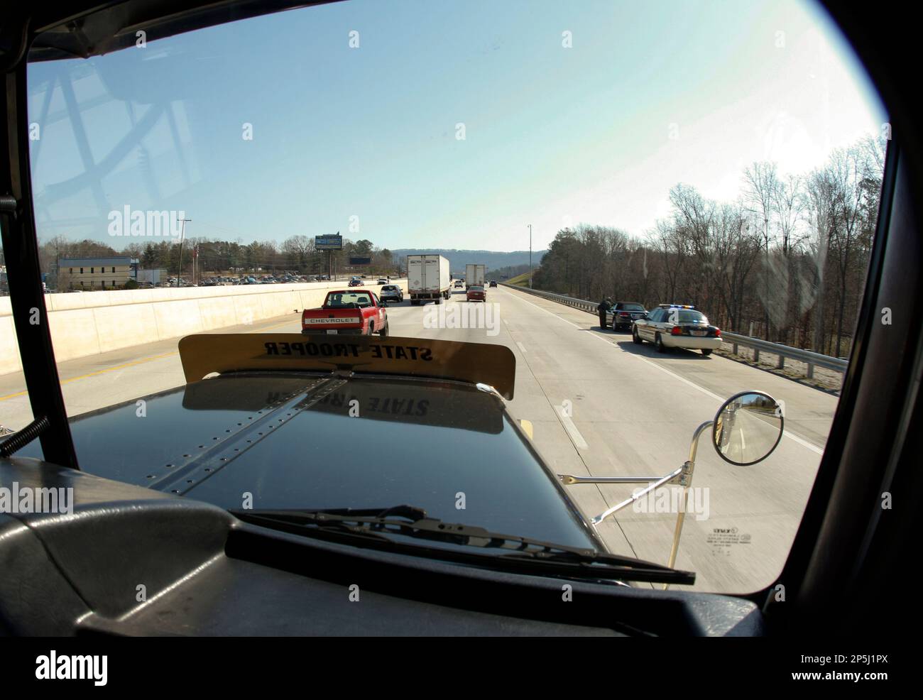 Tennessee State Trooper Gordon Roberts passes a fellow trooper while ...