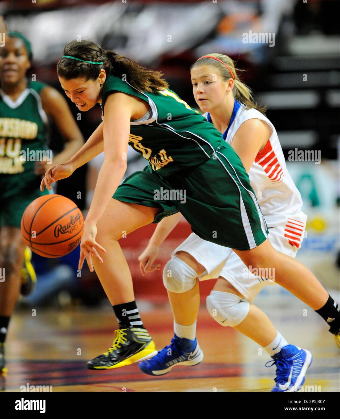 Owensboro Catholic's Mikayla Berry races past Lincoln County's Emily ...