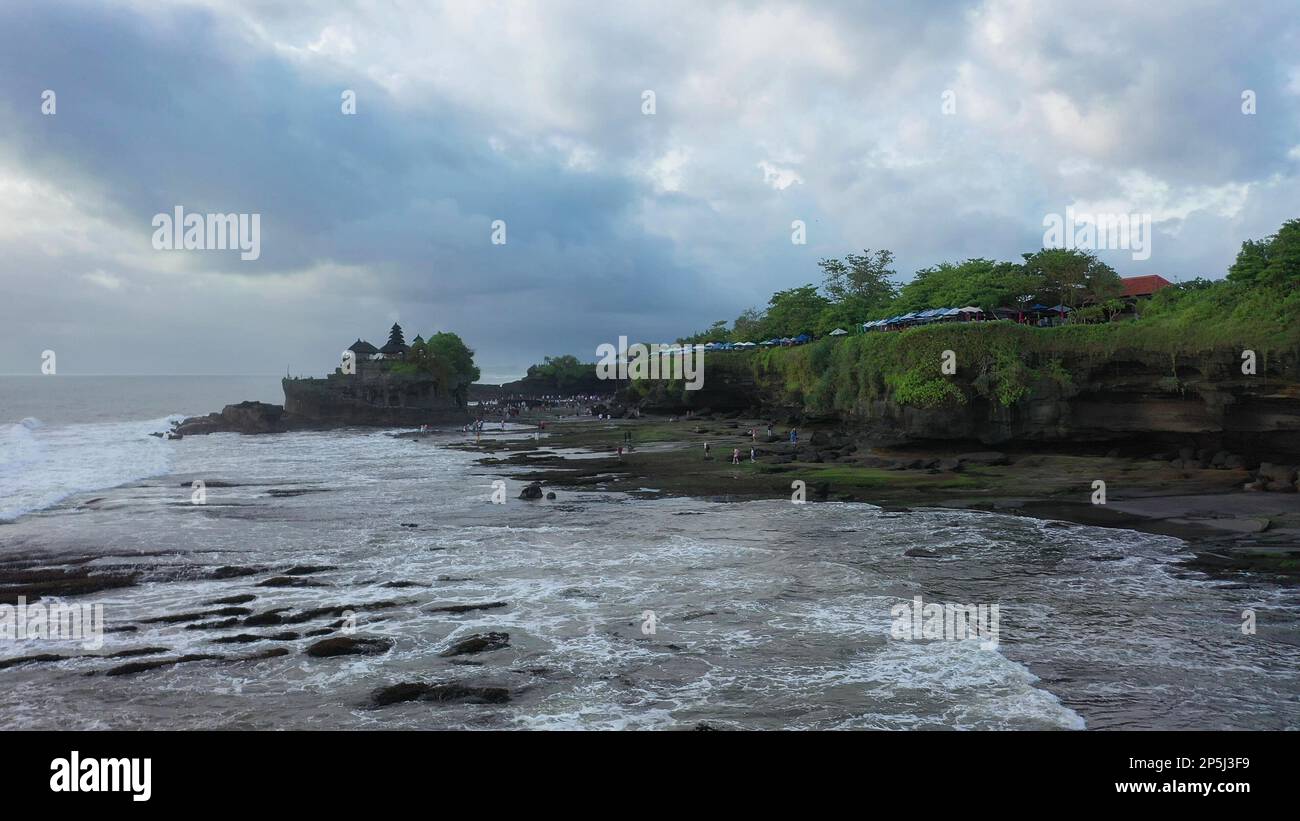 Panorama shot of the temple complex Pura Tanah Lot taken from the beach ...