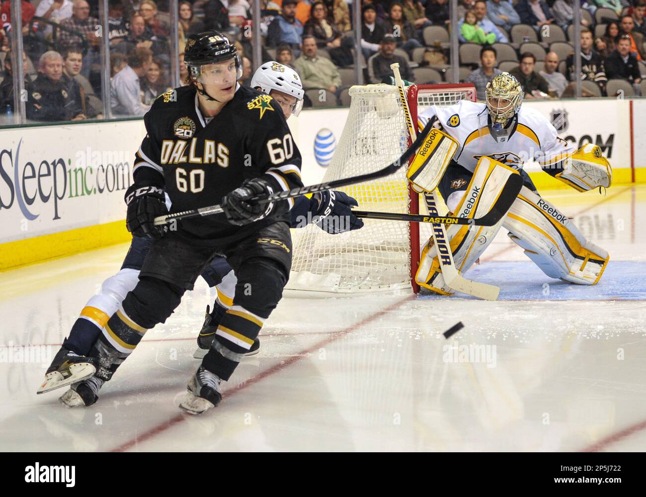 March 12th, 2013.Dallas Stars left wing Antoine Roussel (60) is tripped ...