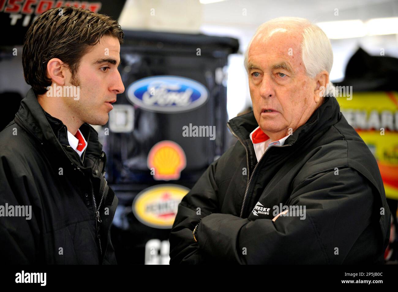 Roger Penske (right) and Travis Geisler (left) during practice for the ...