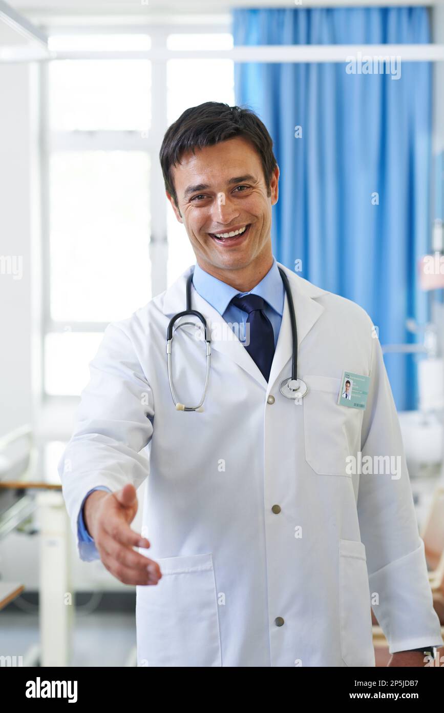 Man extending hand in help hi-res stock photography and images - Alamy