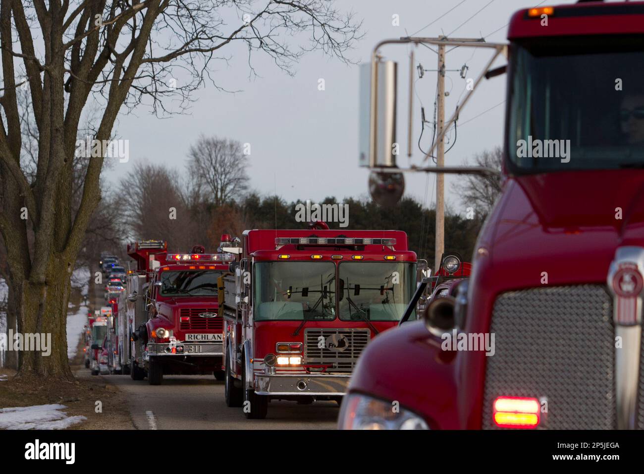The funeral procession for firefighter Nathan Fruin drives into ...