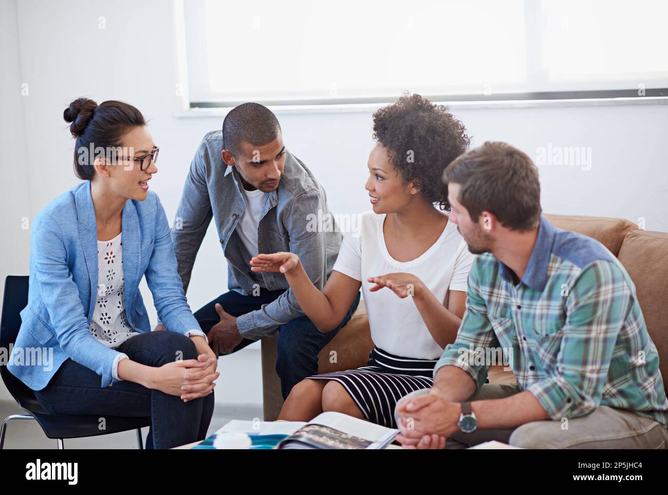 Creative ideas exchange. a diverse group of designers having a meeting ...