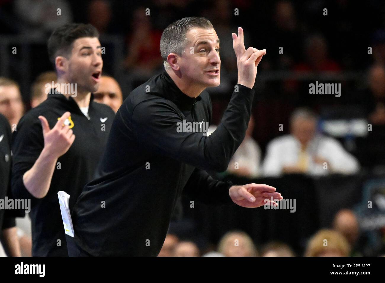 San Francisco head coach Chris Gerlufsen signals to his team during the ...