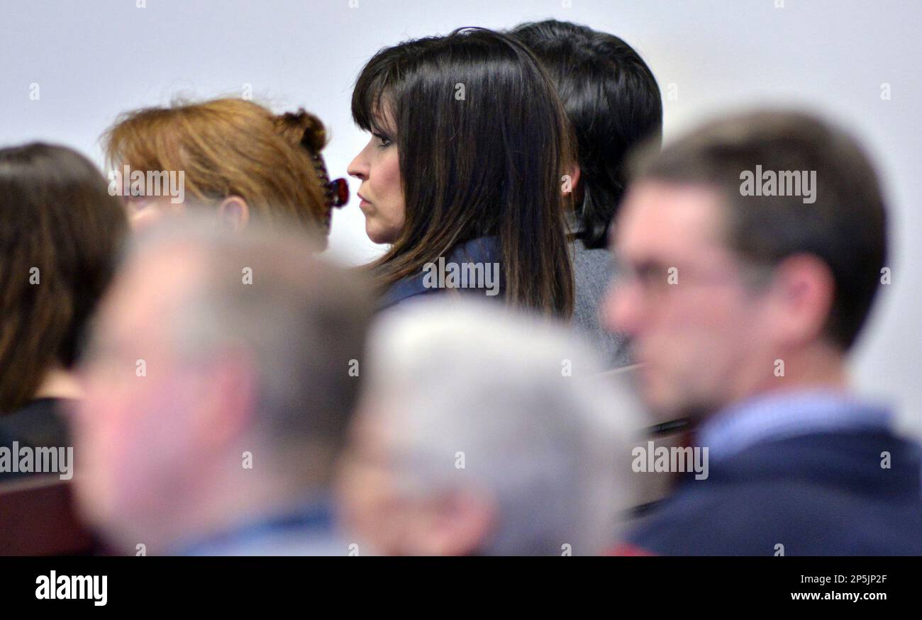 Beth Mattingly-Fujita, center, mother of Nathaniel Fujita, waits in ...