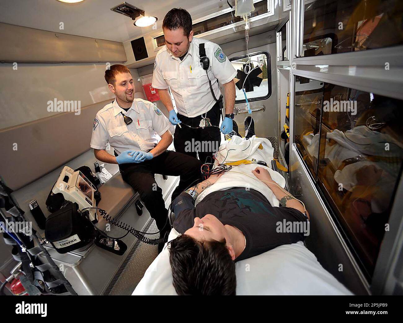 ADVANCED FOR SATURDAY, MARCH 9, AND THEREAFTER Suburban EMS medic ...