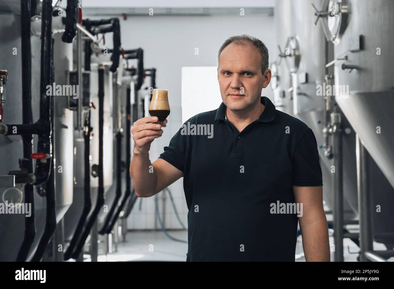 Beer production brewery worker checking hi-res stock photography and ...