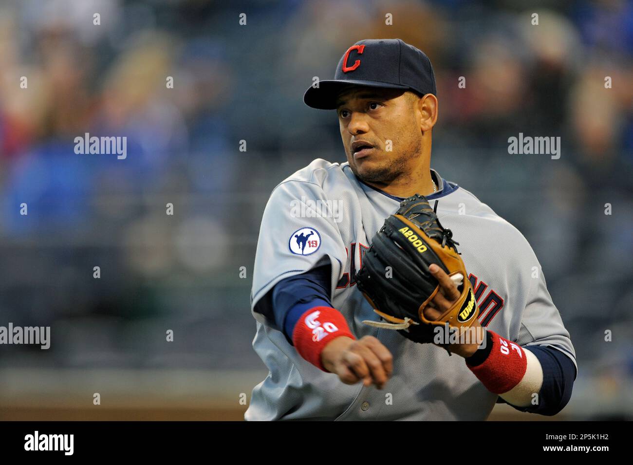 Orlando Cabrera #20 of the Cleveland Indians warms up against the ...