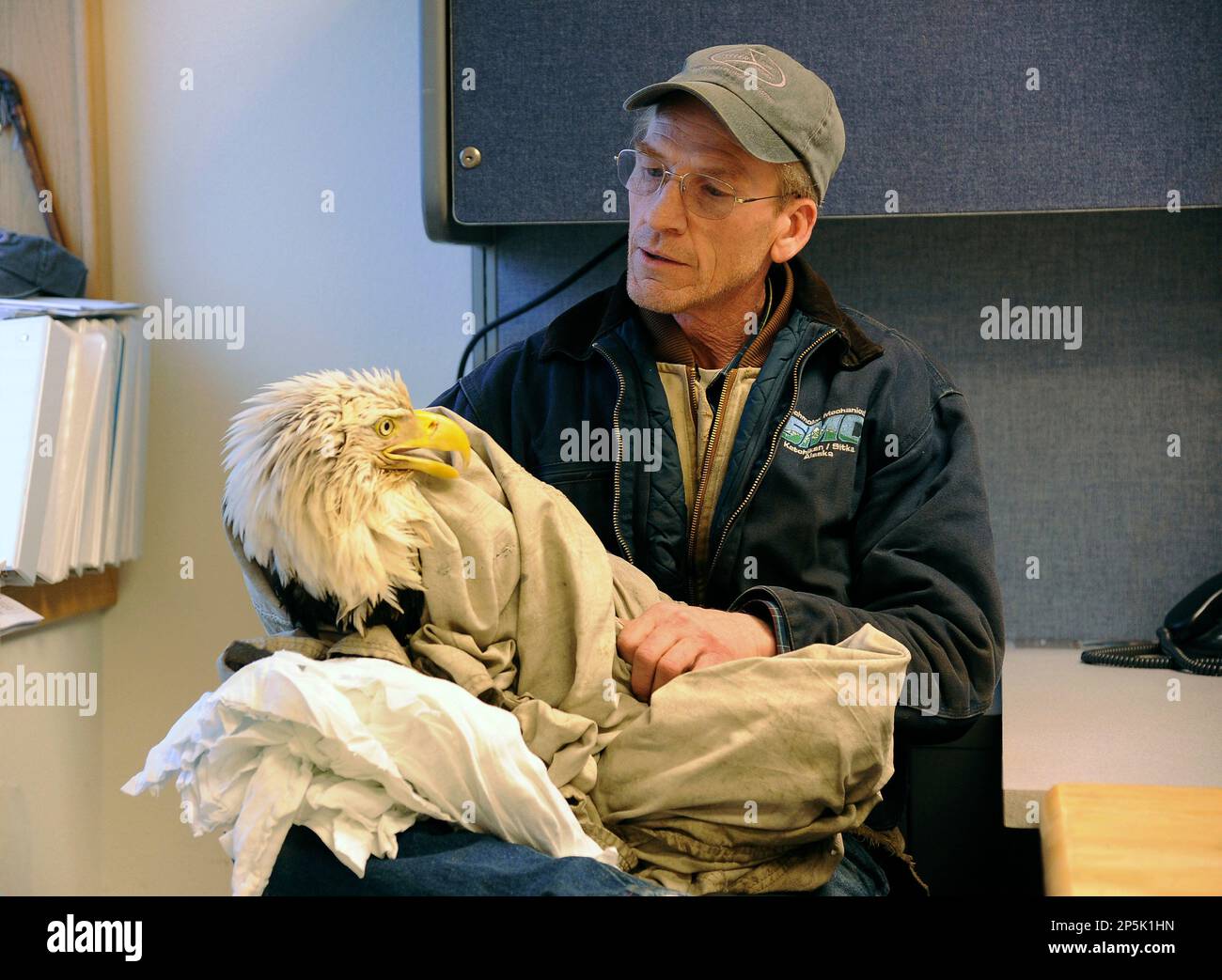 Nathan Brooks, an employee with Schmolck Mechanical Contractors, in ...