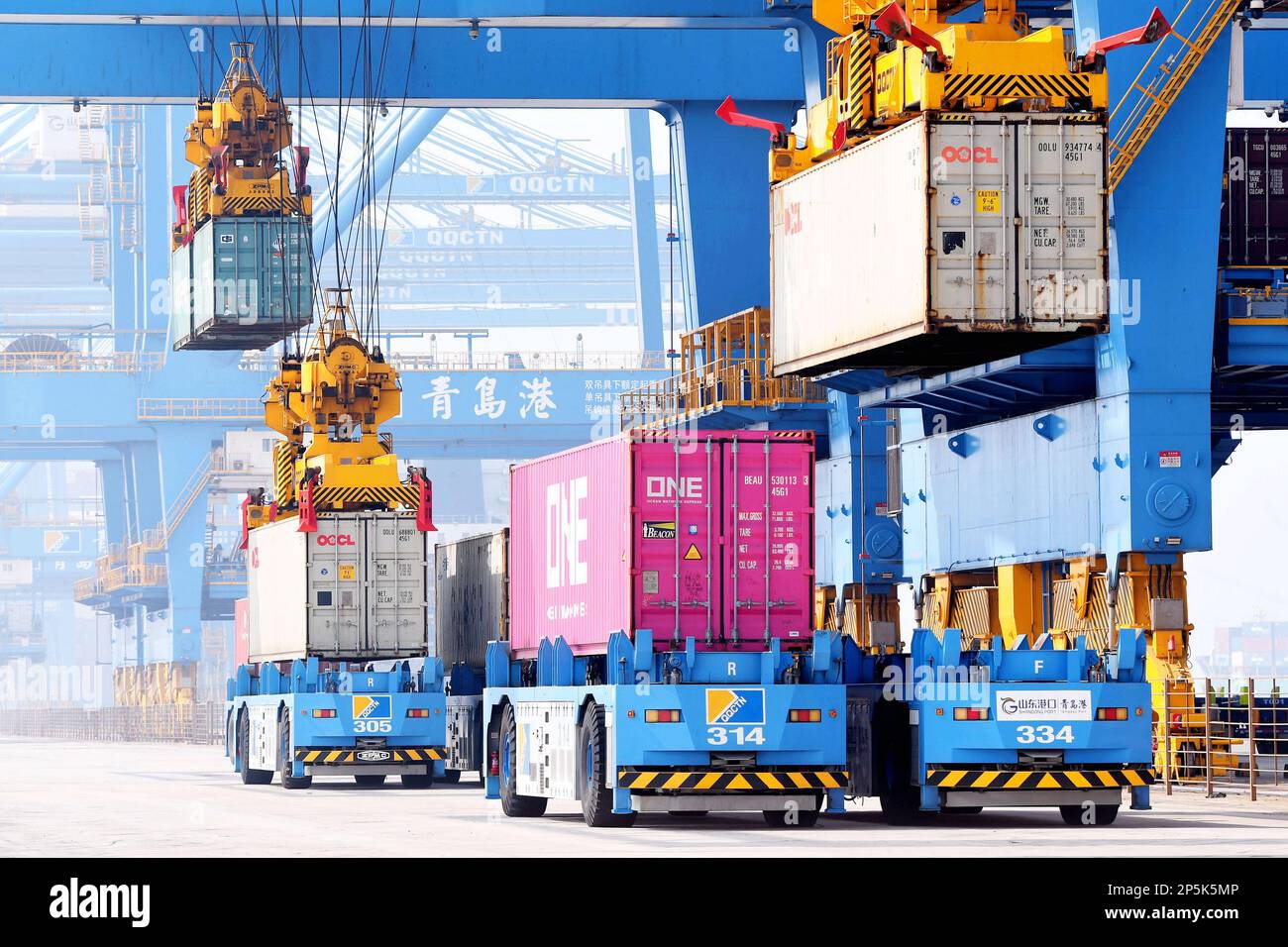 QINGDAO, CHINA - MARCH 7, 2023 - Automatic bridges lift foreign trade ...