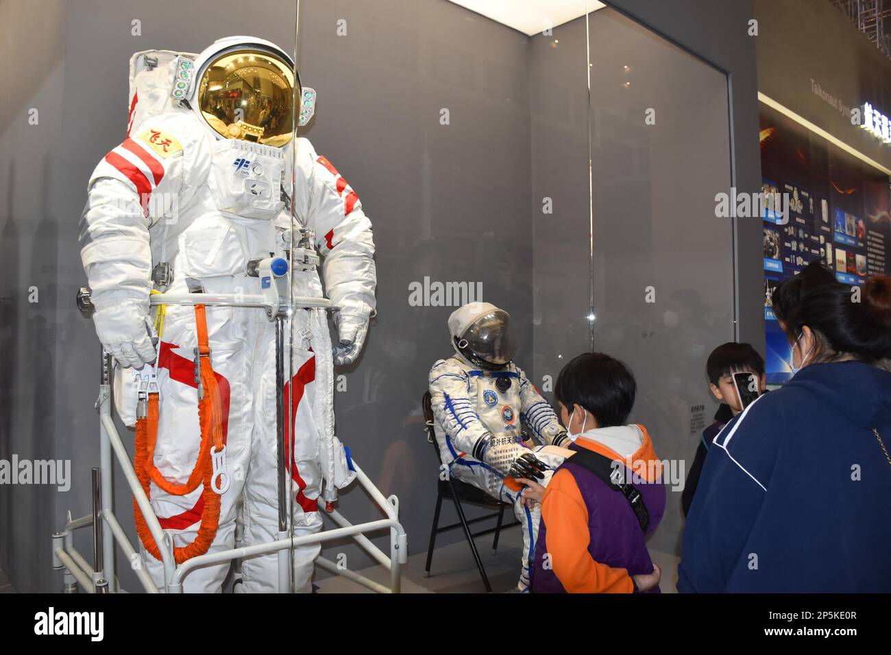 People visit the ongoing exhibition of achievements in China's manned ...
