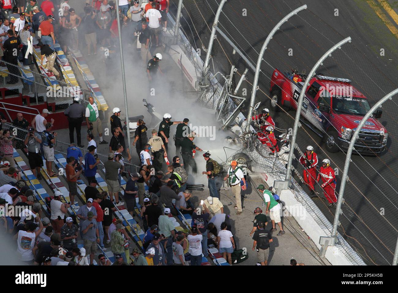 Debris is seen on fire in the spectator grandstand area after a massive ...