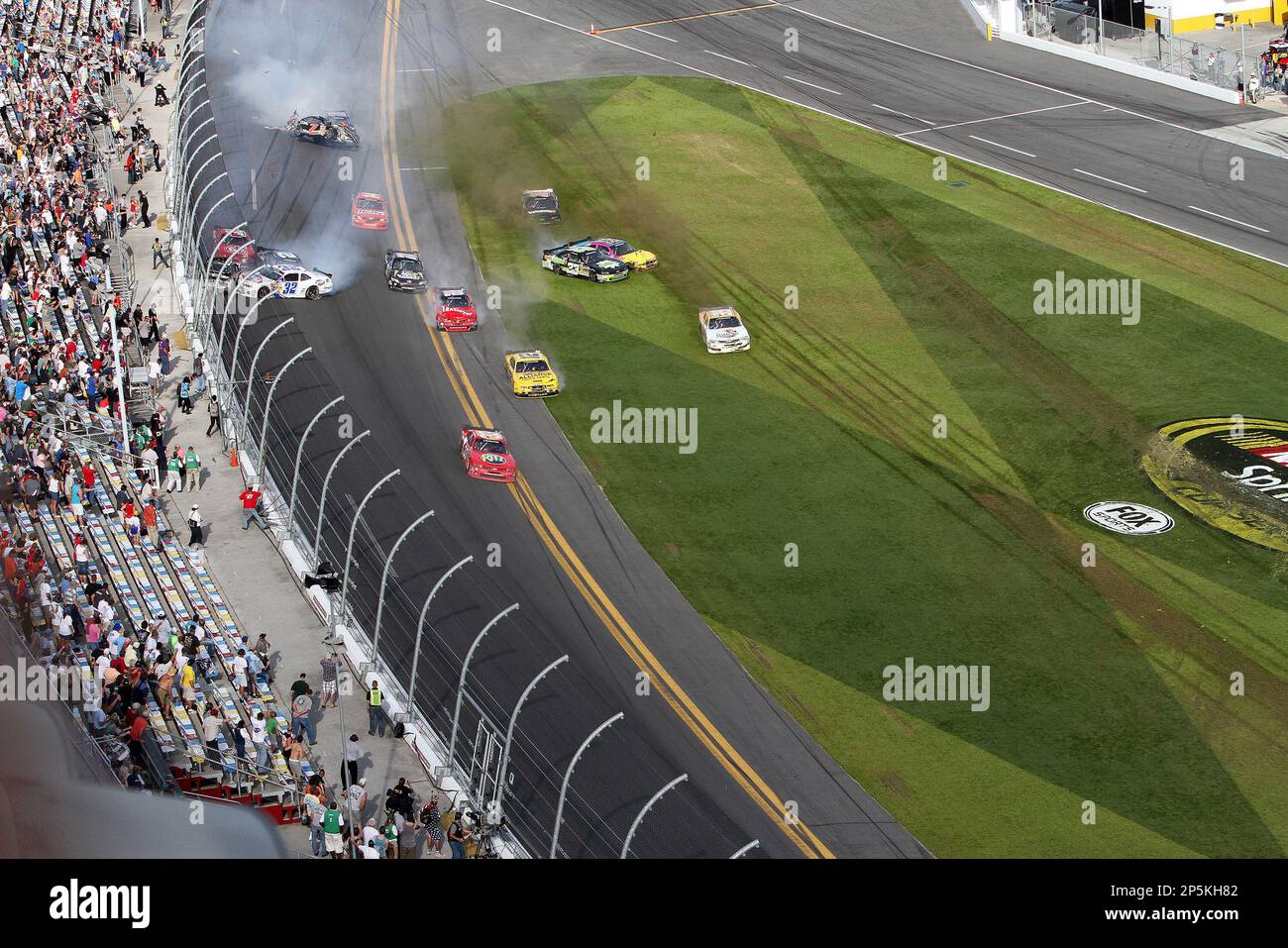 A horrific wreck of NASCAR driver Kyle Larson occurs with debris flying ...