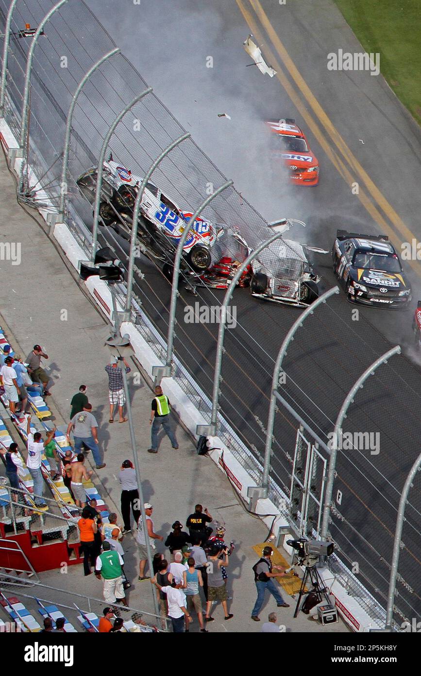 A horrific wreck of NASCAR driver Kyle Larson occurs with debris flying ...