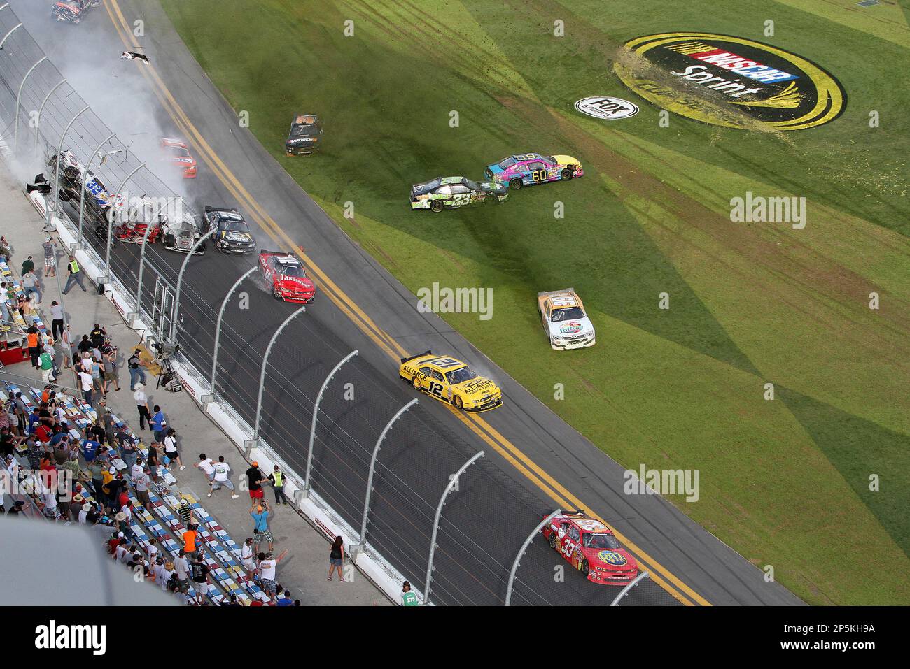 A horrific wreck of NASCAR driver Kyle Larson occurs with debris flying ...
