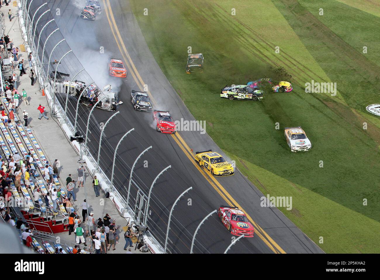 A horrific wreck of NASCAR driver Kyle Larson occurs with debris flying ...